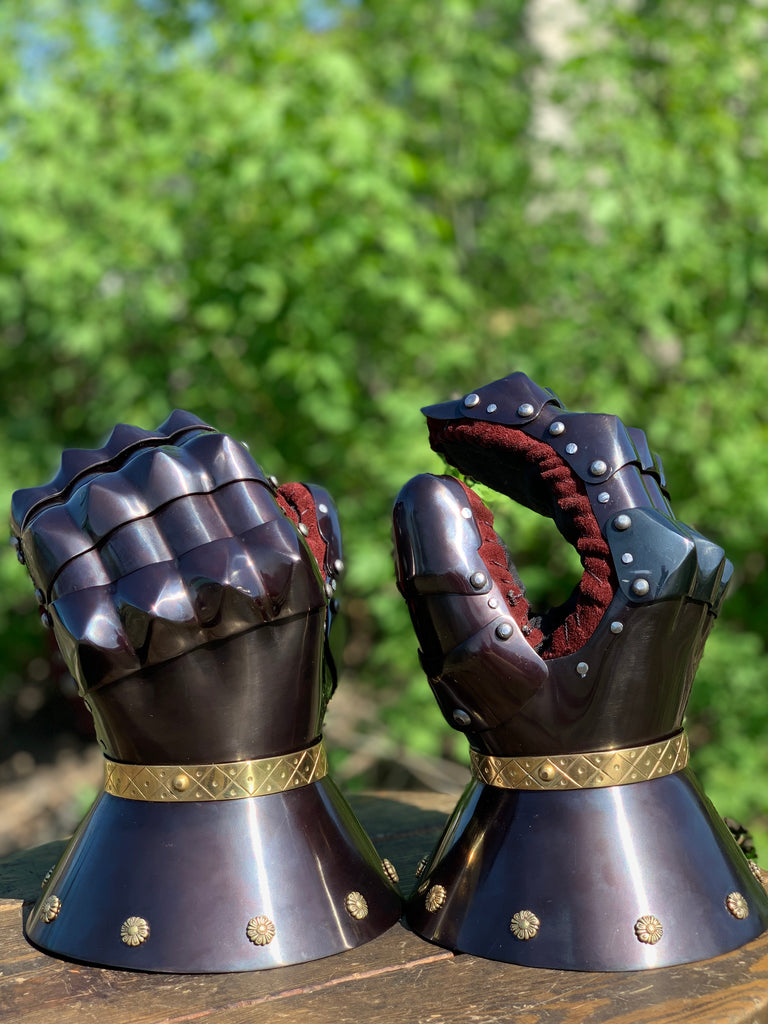 “Black Taurus” gauntlets with golden decoration (tempered steel ...