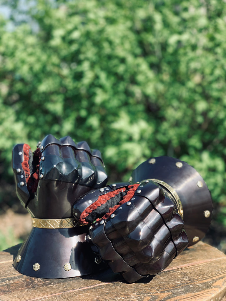 “Black Taurus” gauntlets with golden decoration (tempered steel ...